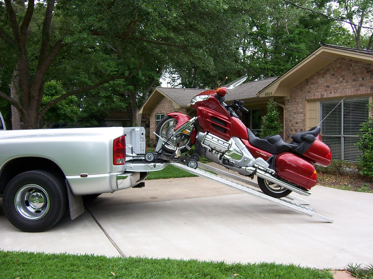 loading motorcycle into pickup